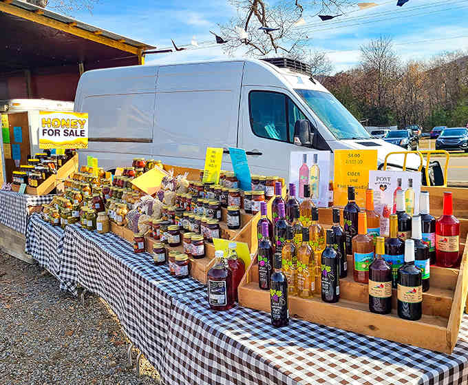 Local honey and homemade wines lined up like liquid gold, sweetness and spirits straight from Alabama's hardworking artisans.