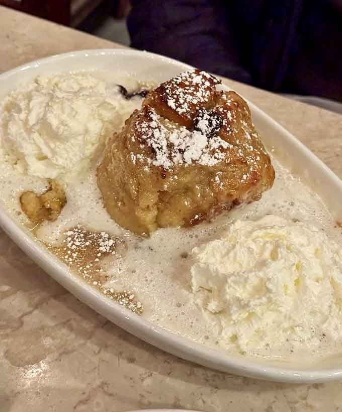 Warm bread pudding with caramel drizzle, the kind of comfort that makes everything else fade away.