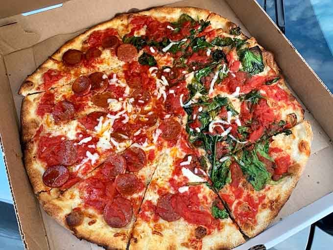 Half pepperoni, half spinach means nobody has to compromise on their tomato pie dreams tonight.