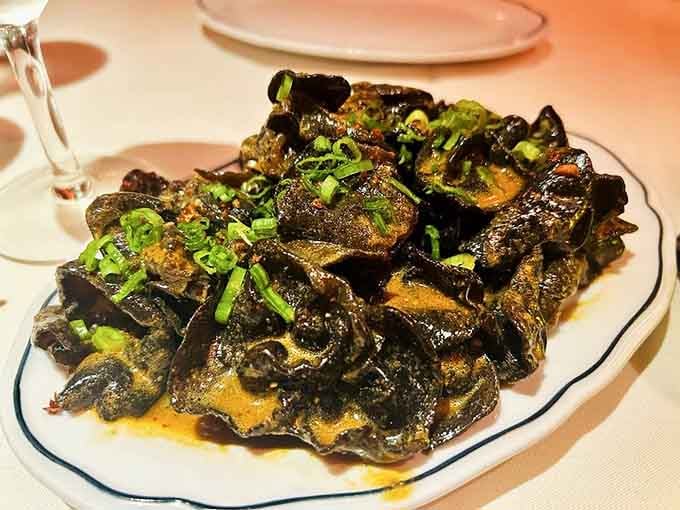 Cloud Ear Mushrooms glisten with chili oil and garlic, proving vegetables can be just as thrilling as any protein dish.