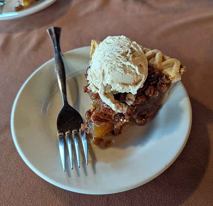 Pecan pie crowned with vanilla ice cream melting into caramel sweetness is how grandma would've done it, if she'd been this generous.