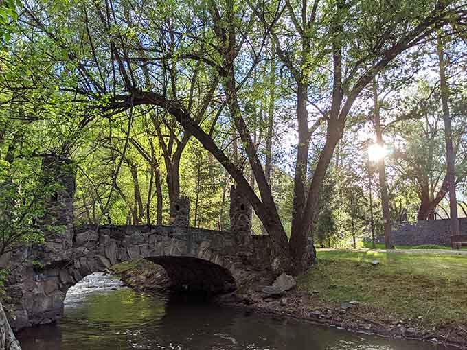 A stone bridge over rushing water that looks centuries old but sits right here in Colorado's backyard.