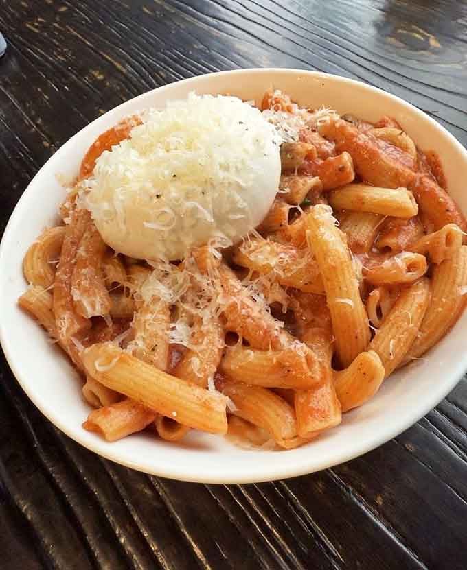 That cloud of burrata melting into tomato-coated rigatoni is basically what dreams are made of, friends.