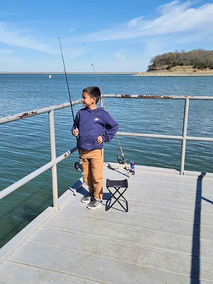 Young anglers learning patience by the water, proving fishing is still the best teacher money can't actually buy.