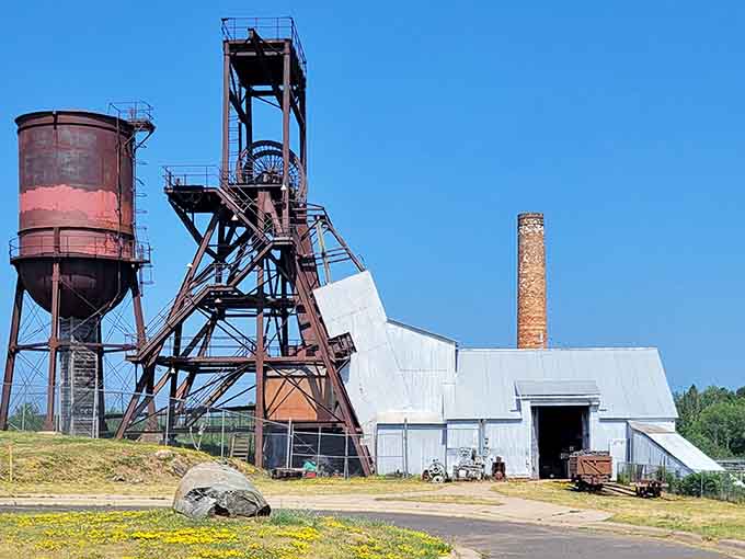 The Pioneer Mine headframe stands tall, a rusty monument to the iron ore days that built this town.