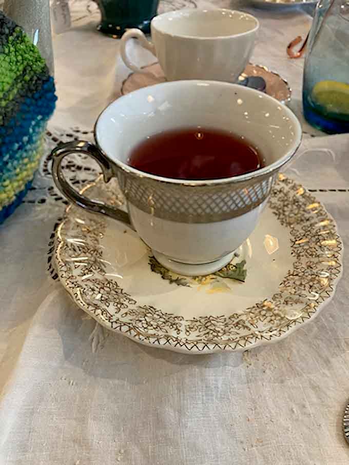 Delicate china and perfectly brewed tea served the way it was meant to be, in an actual cup with a saucer.