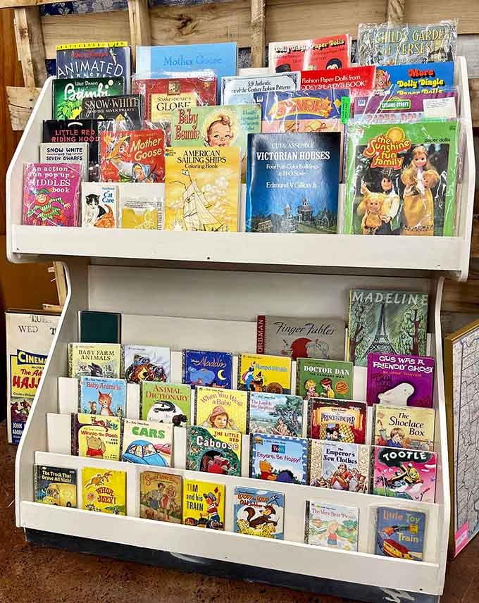 Little Golden Books lined up like a time machine to Saturday mornings in footie pajamas.