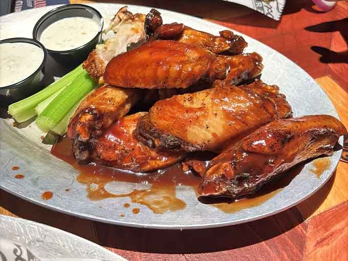 These BBQ wings arrive glistening like they've been detailed at the world's most delicious car wash.