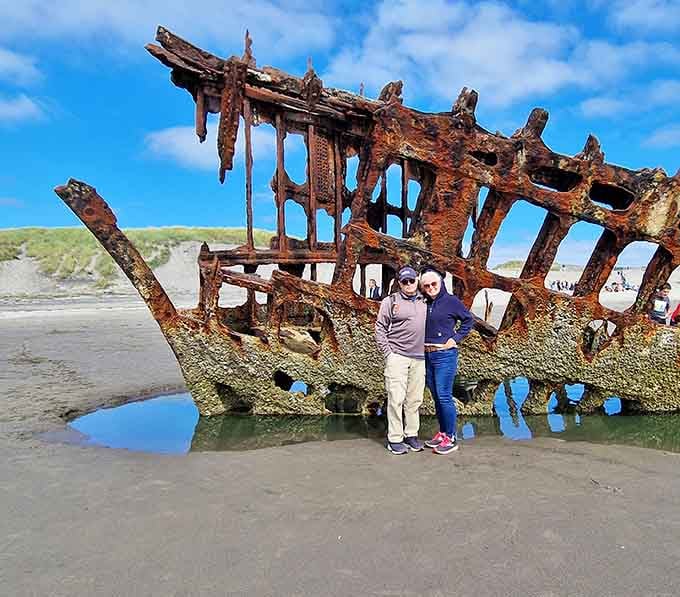 The wreck's dramatic silhouette proves some things get more photogenic with age, rust, and a century of character building.