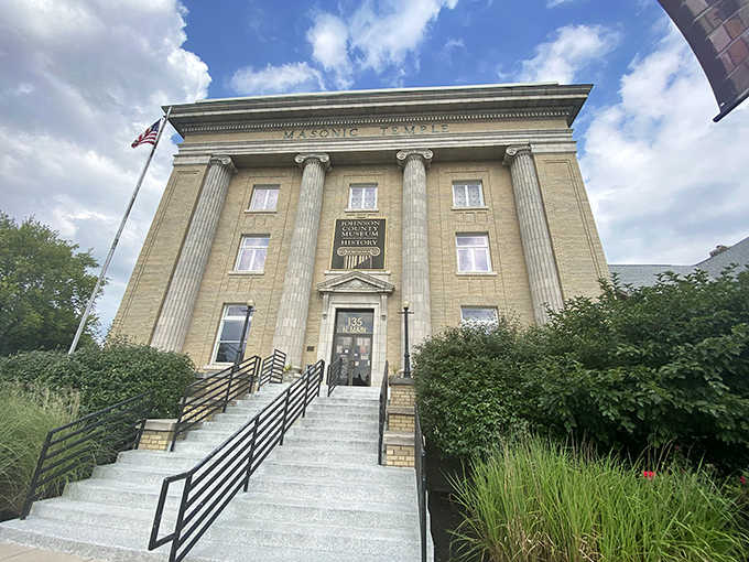 Classical architecture meets local history in a building that looks like it belongs on a postage stamp.
