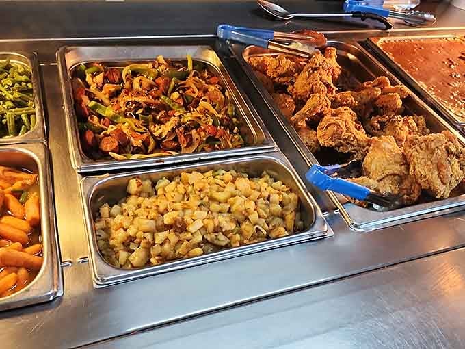 The buffet line stretches out with fried chicken, mac and cheese, and vegetables begging you to fill that plate.