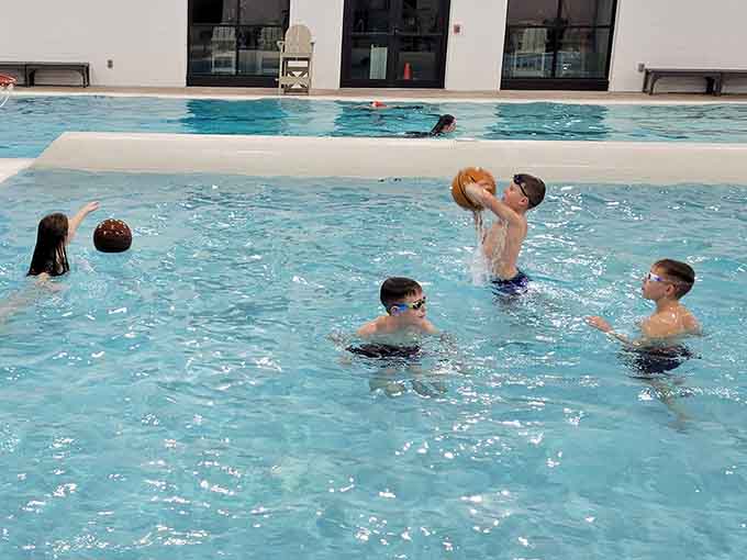 Parents and tots share gentle slides together, creating memories without requiring anyone to sign a liability waiver first.