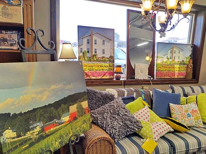 Colorful throw pillows and that striped couch create a display that'd make any home decorator swoon instantly.