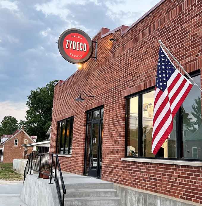That Zydeco sign glowing against historic brick is the kind of contrast that makes small towns interesting.