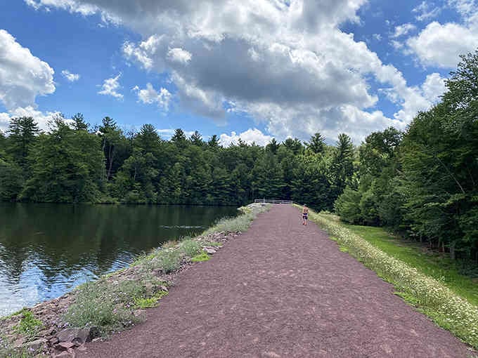 This paved path along the lake proves accessibility and natural beauty aren't mutually exclusive concepts after all.