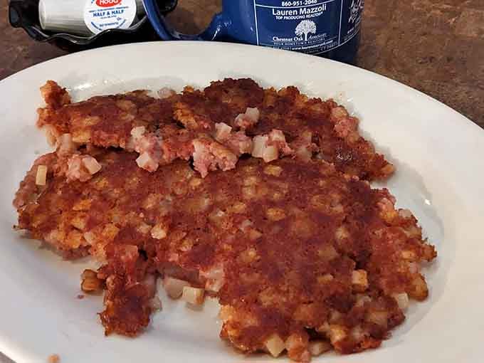 Corned beef hash with actual chunks of meat, proving that some things are worth getting out of bed for.