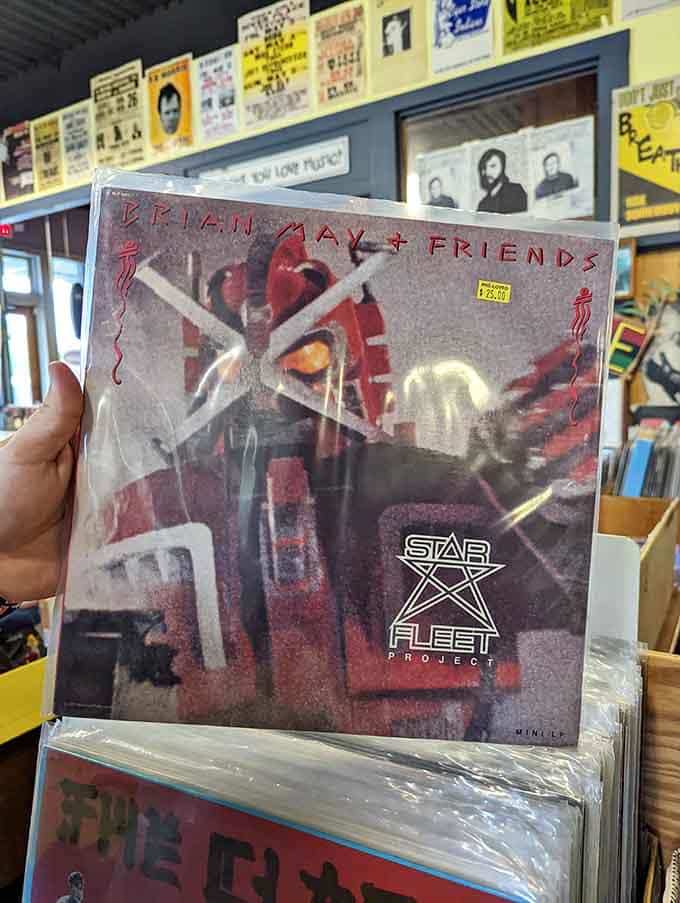 Brian May and friends reminding us that sometimes the most unexpected collaborations create the most interesting album art.