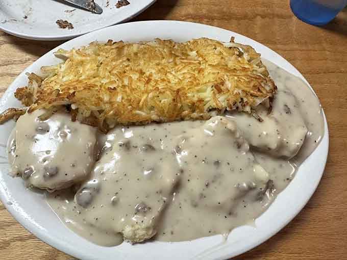 When biscuits meet sausage gravy and crispy hash browns, beautiful things happen on a plate in Branson, Missouri.