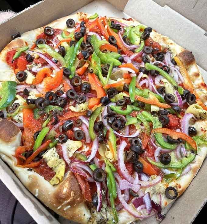 When vegetables look this good on pizza, even your doctor would approve of this prescription for happiness.