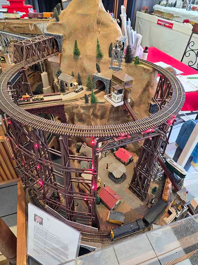 Trains climb mountains and cross trestle bridges in this spectacular display of vertical engineering and creative ambition.