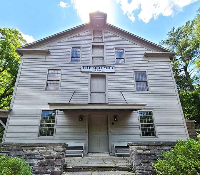 The Old Mill's weathered facade tells stories of industry past, now preserved for future generations to actually appreciate.