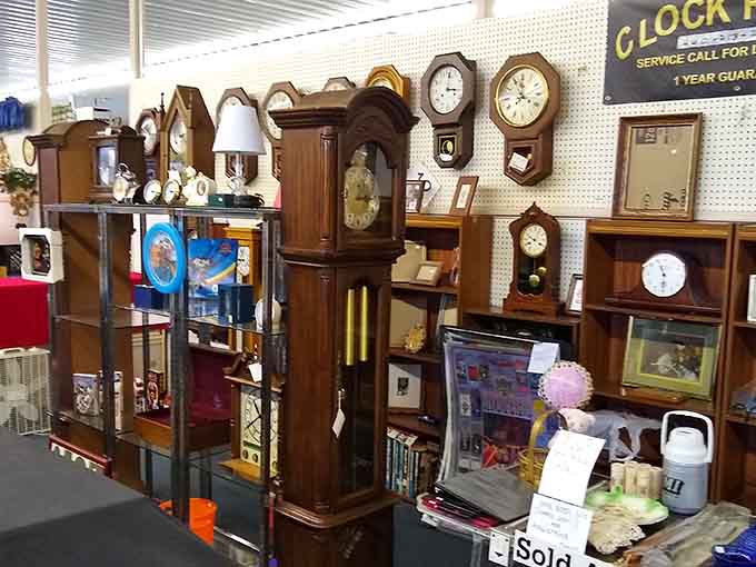 Grandfather clocks standing at attention like wooden soldiers, each one ready to mark time in someone's home.