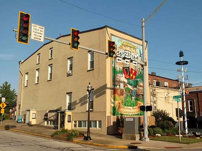That colorful mural celebrates local heritage with the kind of pride that makes you stop and actually look up.