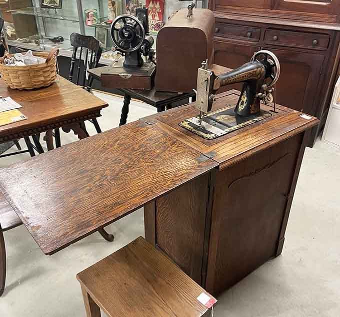 These Singer machines built clothing empires one stitch at a time, no electricity required, just determination.