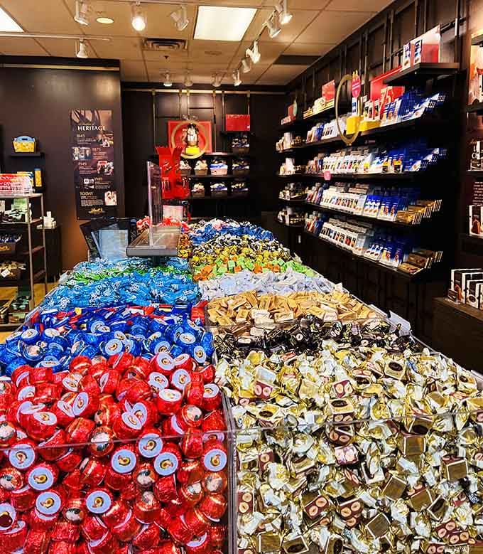 A chocolate lover's paradise arranged in perfect rainbow formation, because calories consumed while shopping absolutely don't count.