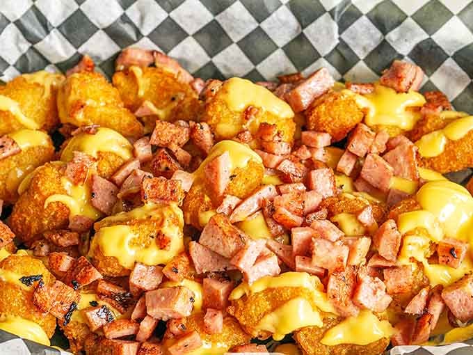 Tater tots loaded with cheese and pork roll, because regular tots are for people without ambition.