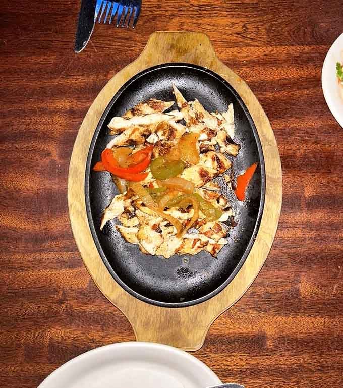 When those fajitas hit your table sizzling and steaming, everyone within earshot suddenly regrets their menu choice.