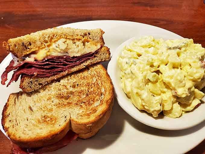 That Reuben's got more layers than a good mystery novel, corned beef piled high between toasted perfection.