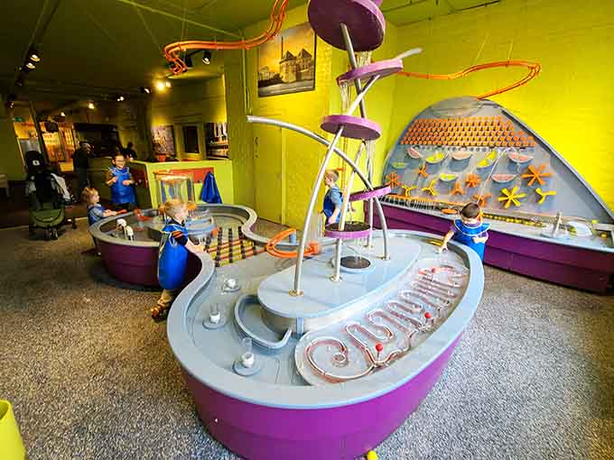 Watch kids discover that water plus physics equals pure joy, and try not to wish you could join them.