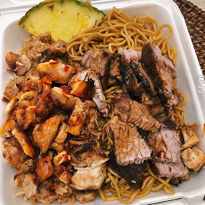 Tri-tip and teriyaki chicken sharing one plate is like a delicious peace treaty between cooking styles.