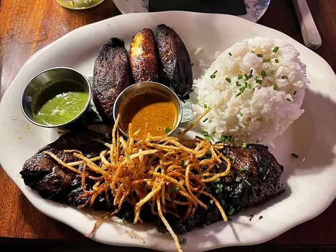 Churrasco topped with crispy potatoes proves that sometimes the best things come with delicious little hats on top.