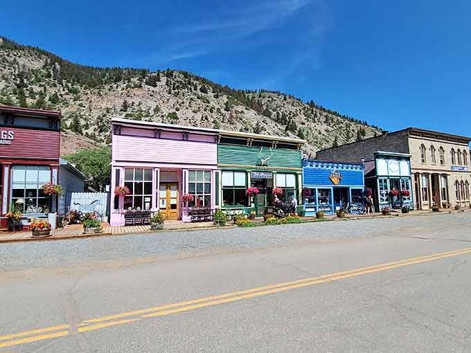 These colorful storefronts line up like a rainbow of history, each false front hiding stories taller than the buildings themselves.