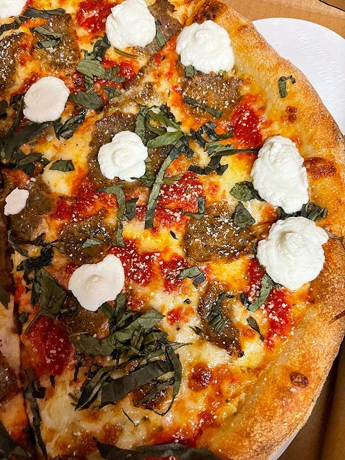 Fresh basil, dollops of ricotta, and that golden crust make this pie worth celebrating year-round.