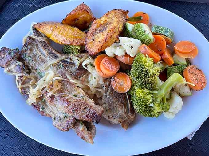 Pork chops with colorful vegetables prove that eating your greens doesn't have to feel like a punishment.