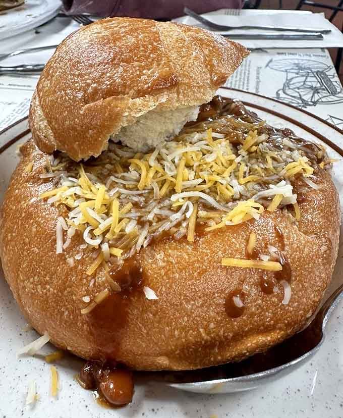 Chili served in a bread bowl transforms lunch into an edible adventure worth every carb.