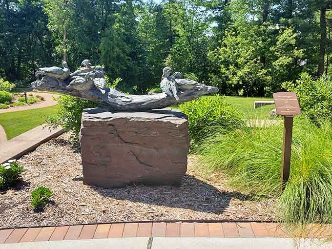 Wood ducks perched on a log, frozen in bronze perfection, more photogenic than most Instagram influencers.