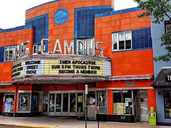 The Campus Theatre's art deco marquee glows like a beacon, reminding us when movies were events.