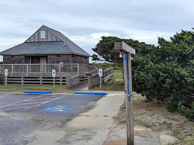 The bathhouse stands ready to rinse off your sandy adventures and questionable life choices.