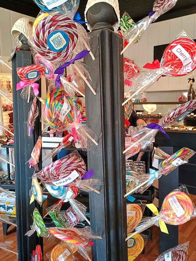 Lollipops wrapped and ready, spiraling up like a candy Christmas tree that celebrates sweetness year-round daily.