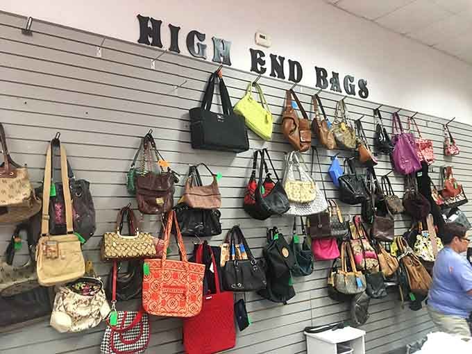 Designer handbags rubbing elbows with everyday totes, all priced like they're having an identity crisis.