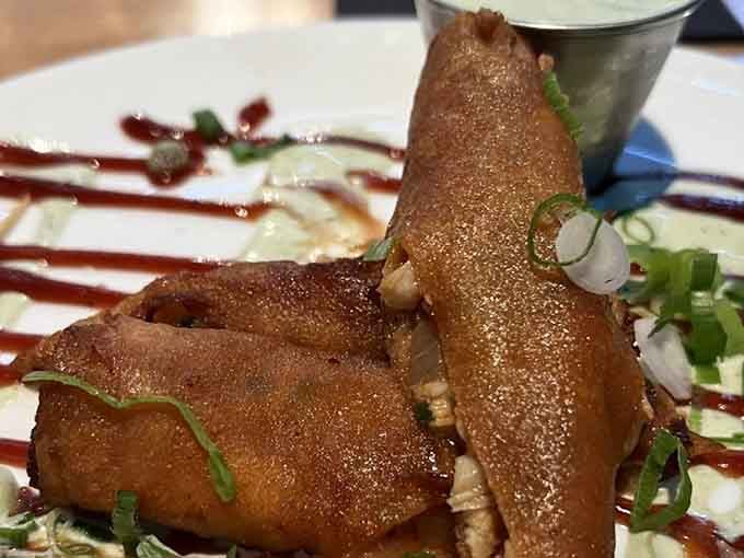 Close-up proof that the wrapper achieves that perfect shattering crispness while the filling stays tender, moist, and absolutely irresistible inside.