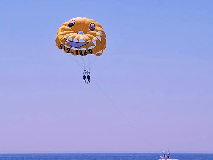 Up, up, and away with a grinning companion overhead, because who says adventure has an age limit anyway?