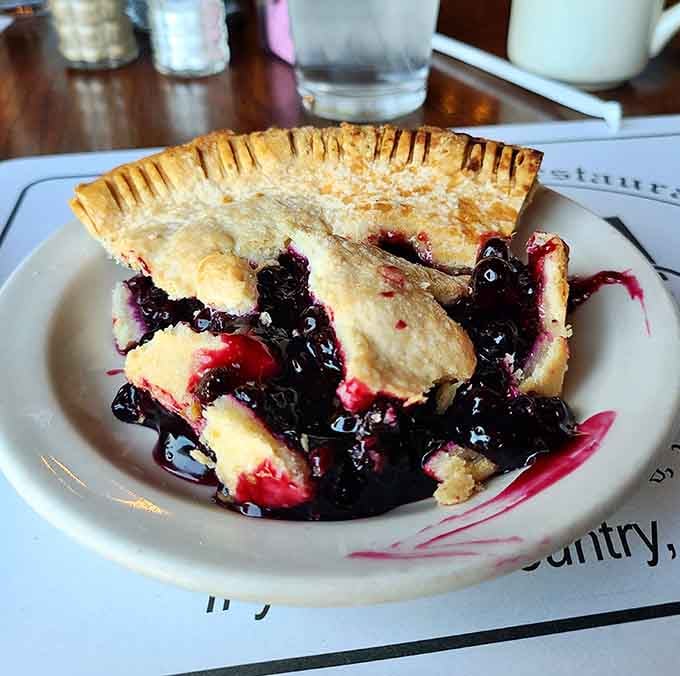 Blueberry pie with a flaky crust that would make your grandmother weep with joy and maybe a little envy.