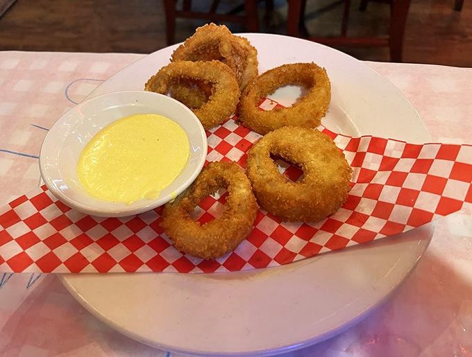 Onion rings with that golden crunch factor, served with a side of pure nostalgic satisfaction.