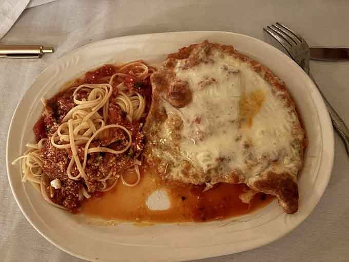 Chicken Parmigiana that looks like it stepped straight out of your fondest Italian food dreams, cheese bubbling with pure joy.