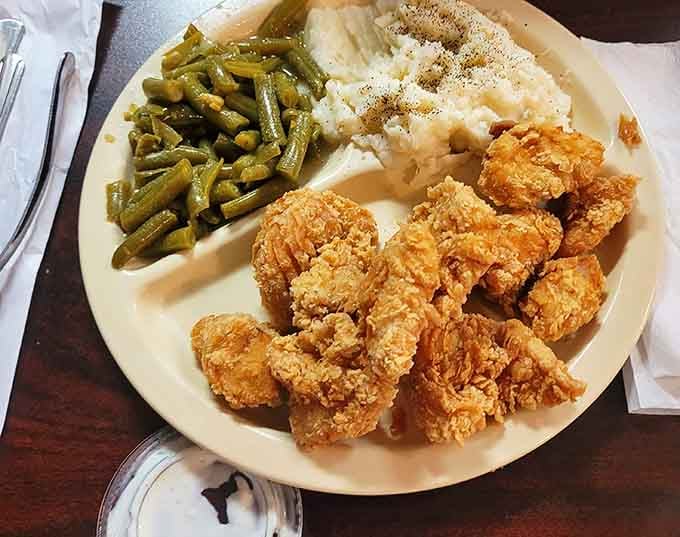 Fried chicken this golden and beautiful deserves its own portrait in a museum of deliciousness.